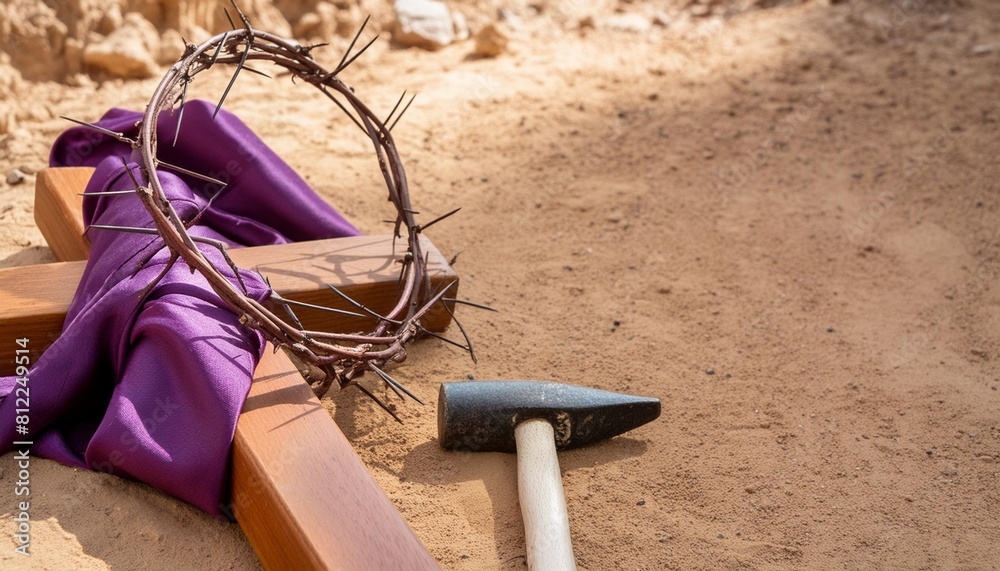 cross made with blood and nail on arid dirt floor with crown of thorns ...