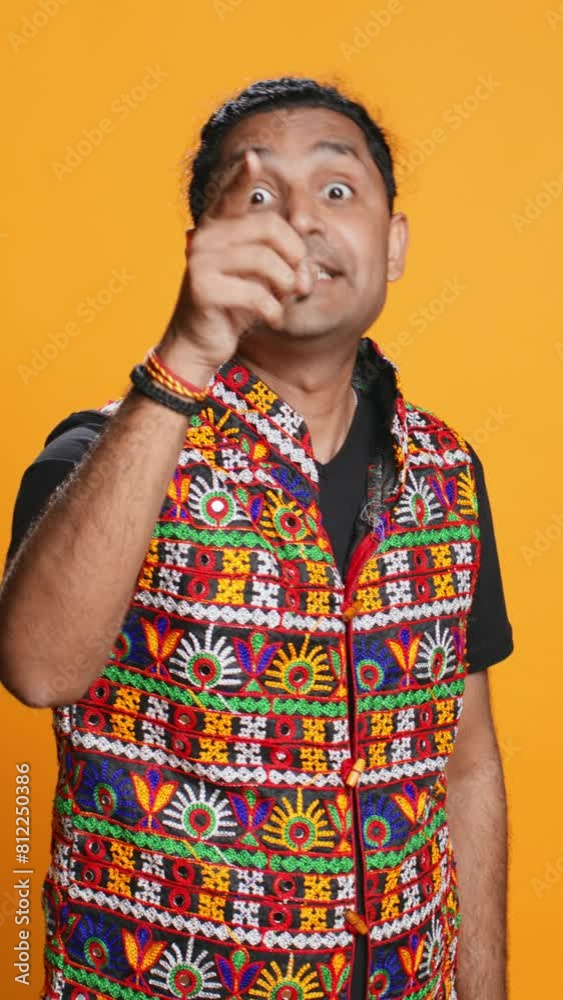 Vertical video Disappointed indian man admonishing friend over debacle ...