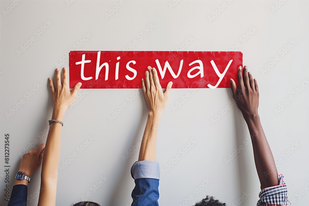 Construct a powerful visual featuring the phrase "this way" against a ...
