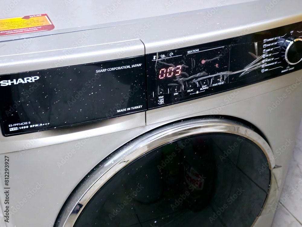 Cairo, Egypt, April 26 2024: Sharp full automatic washing machine 9 KG ...