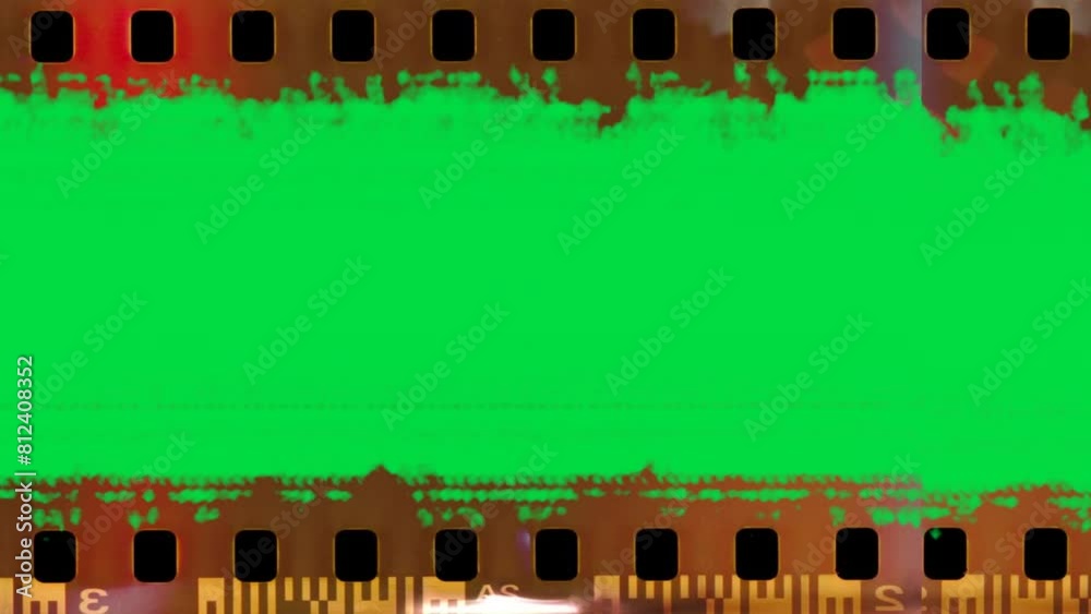 Green screen loop footage of old negative film strip frame. Slow ...