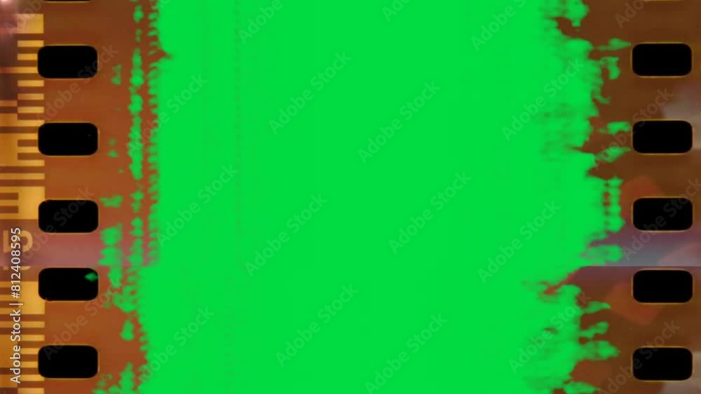 Green screen loop footage of old negative film strip frame. fast motion ...