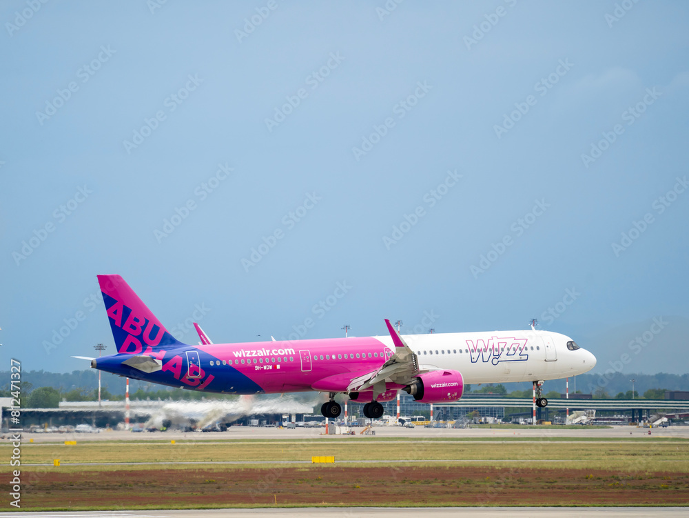 Wizzair Airbus A321 is landing at MXP Milano Malpensa international airport Stock Photo | Adobe ...