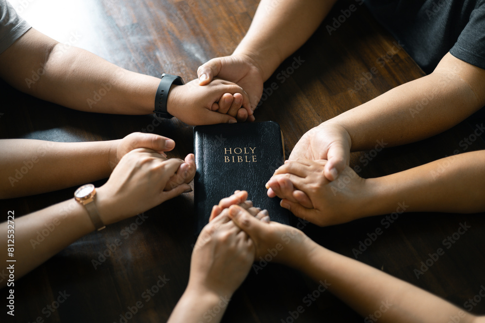 Woman gathered with her Christian friends in church, Bible close as ...