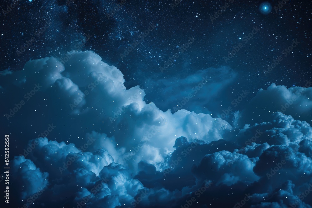 Dark night sky with fluffy clouds and twinkling stars. Suitable for ...