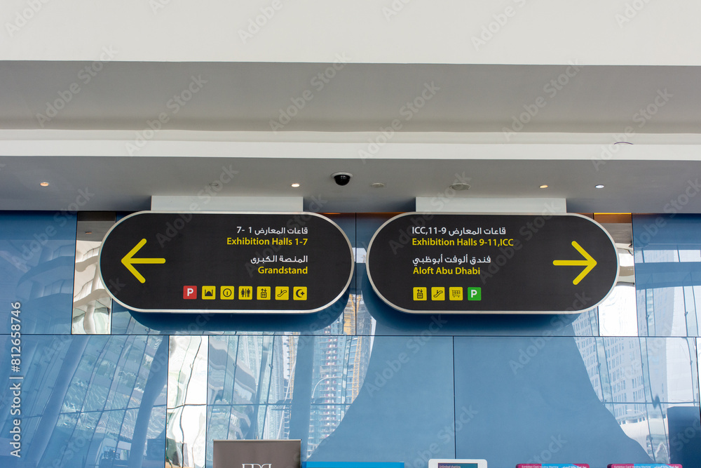 Directional signs in Arabic and English Abu Dhabi International Book ...