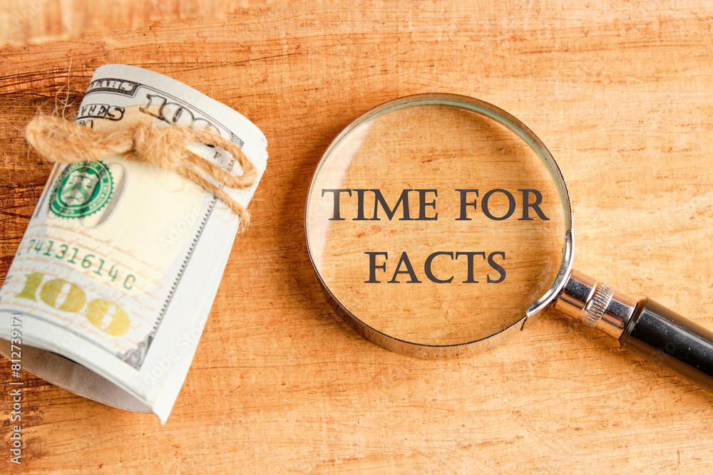 Time for facts message written through a magnifying glass, they are ...