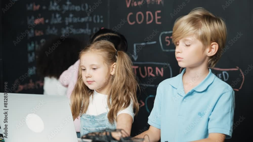 Smart girl using laptop programing engineering code with diverse ...