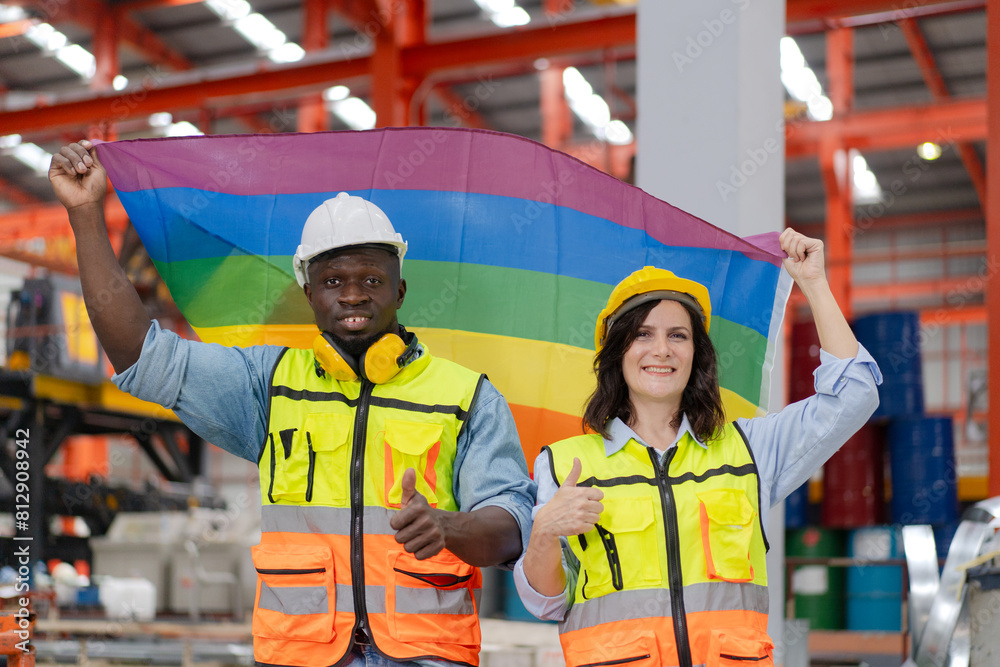 diverse workers thump up and hold rainbow flag to celebrate pride month ...
