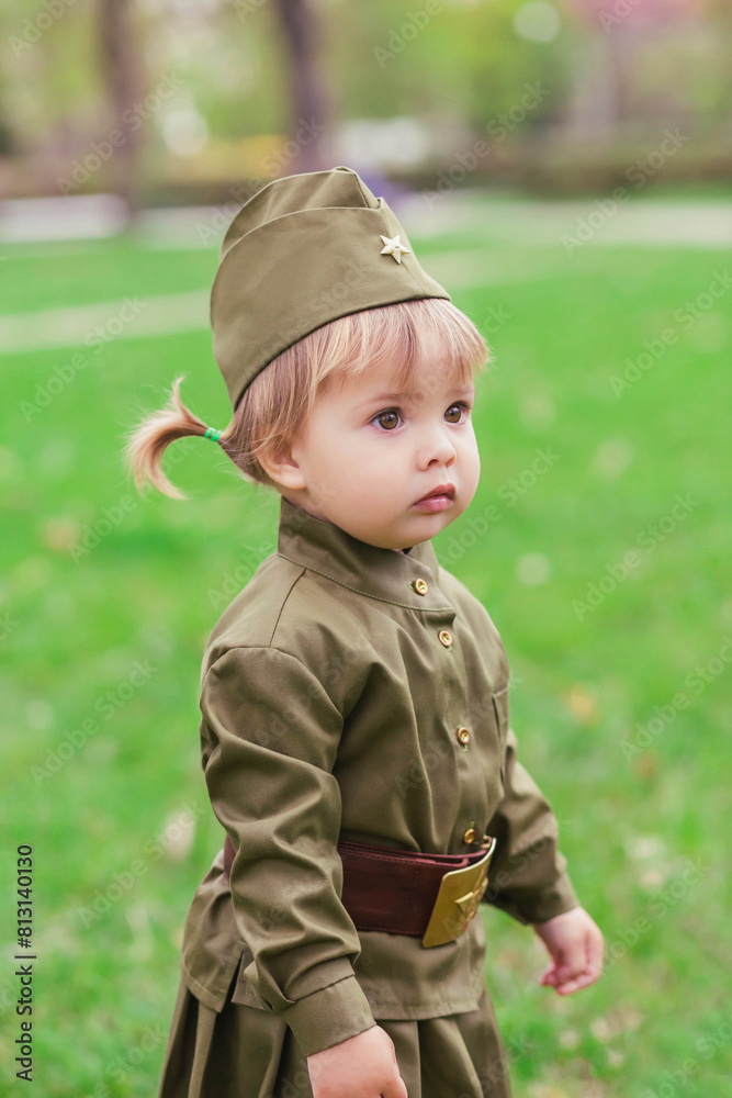 Adorable baby girl in Soviet military uniform Stock Photo | Adobe Stock