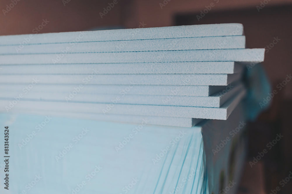 XPS polystyrene insulator boards closeup stacked. Energy efficiency ...