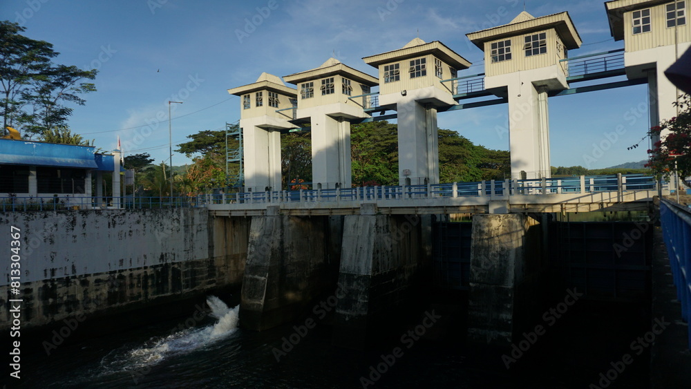 The sluice control building at a dam Stock Photo | Adobe Stock