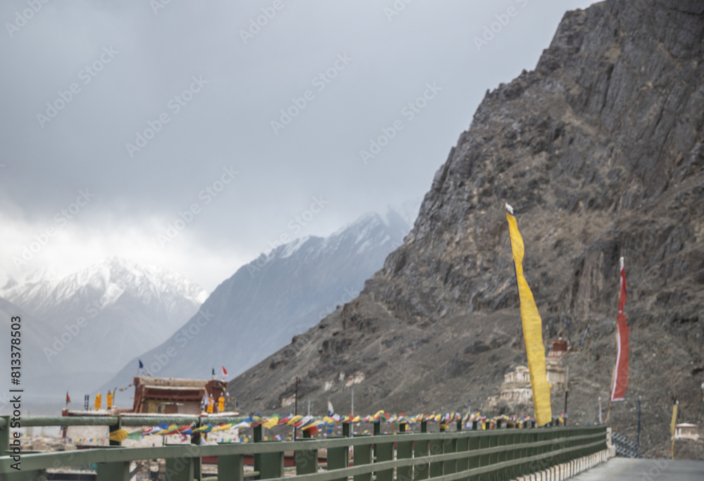 Monasteries in a valley with a background of snow-covered mountains in ...