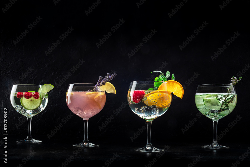 Fancy cocktails with fresh fruit. Gin and tonic drinks with ice at a ...
