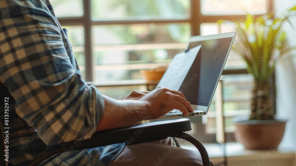 Realistic image shows a person using a laptop to read and reply to ...