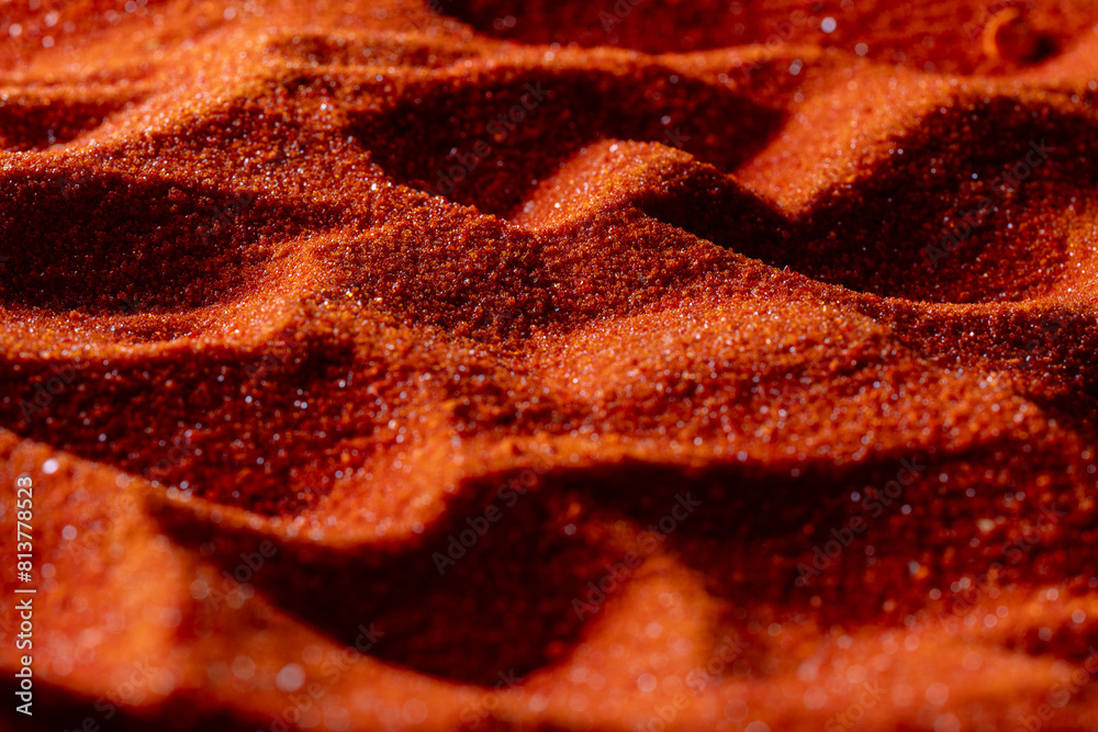 Small bright orange crystals of potassium dichromate, closeup, abstract ...