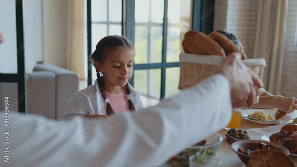 Arabian family from Dubai having lunch together in a cozy apartment ...