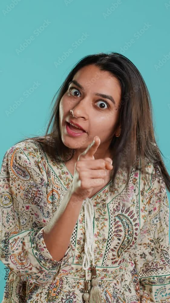 Vertical video Irked indian woman fighting with boyfriend, doing ...