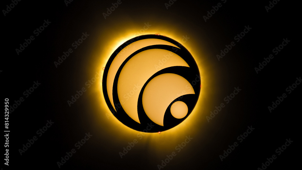 The phases of a total solar eclipse combined over a photo of a glowing ...