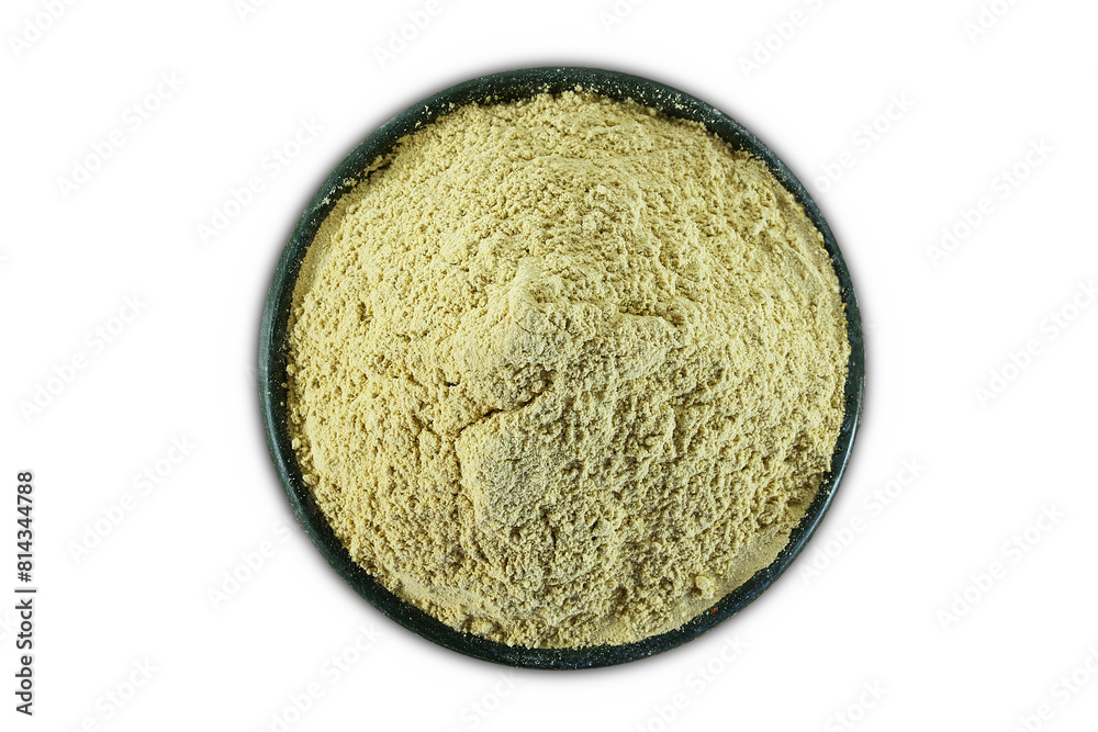 fuller earth or multani mitti powder in bowl for traditional herbal ...