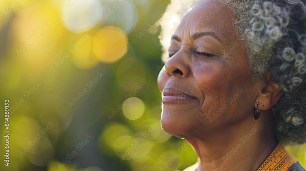 Grateful Senior African American woman closing eyes in Spiritual ...