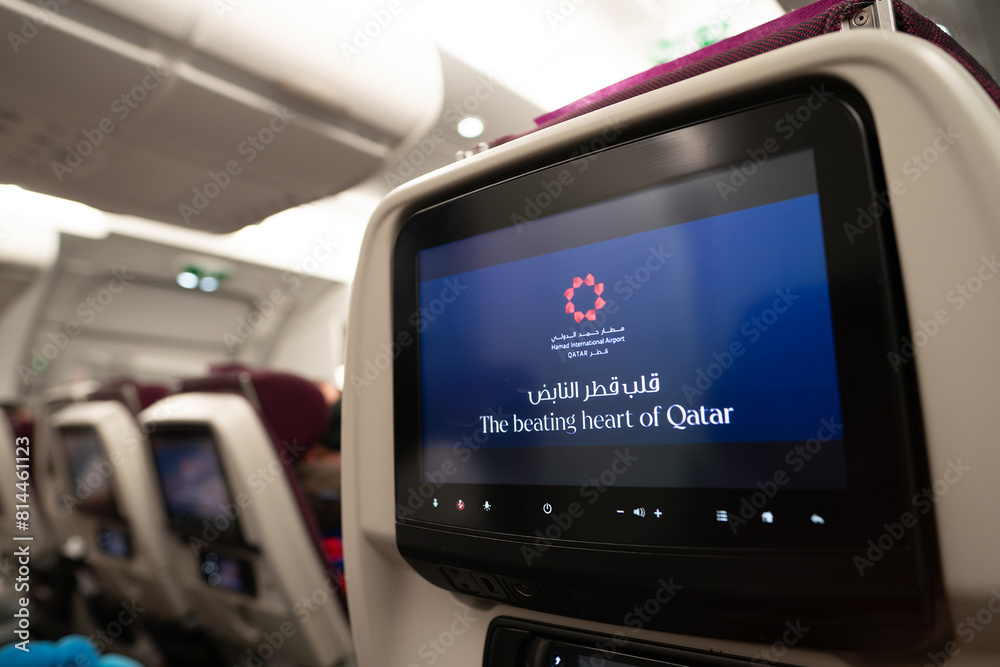 DOHA, QATAR - DECEMBER 15, 2023: a Qatar Airways economy class seat ...