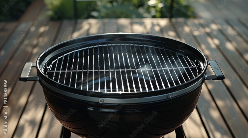 High angle shot of an empty barbecue grill, its blackened interior ...