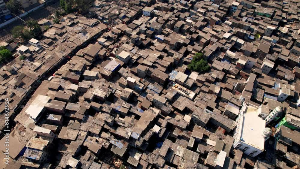 Aerial view flying over the Dharavi slums in Mumbai, Maharashtra, India. Dharavi is considered ...