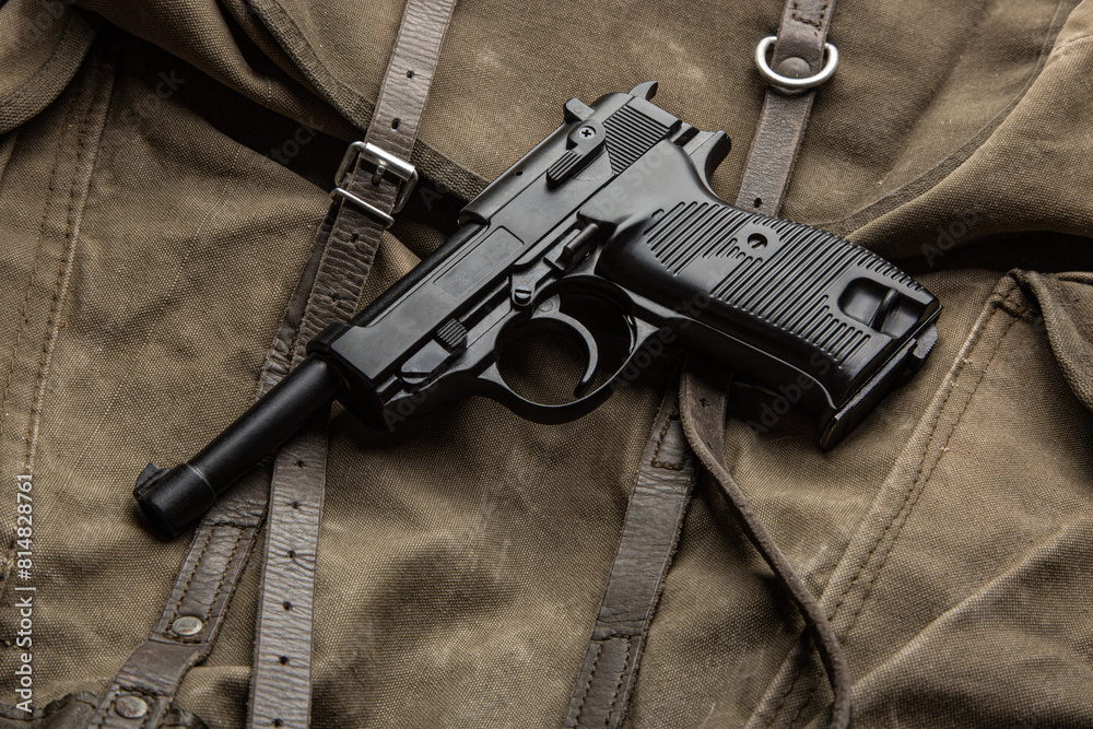 German vintage 9mm pistol from the Second World War. Background from an ...