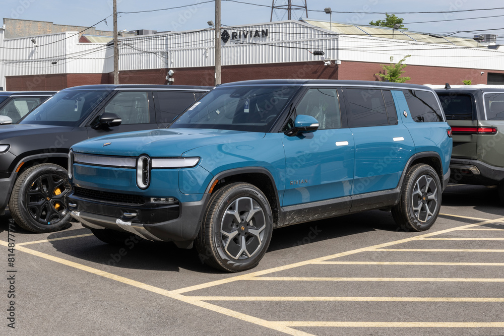 Rivian R1S SUV display. Rivian offers the R1S in Adventure, Adventure ...