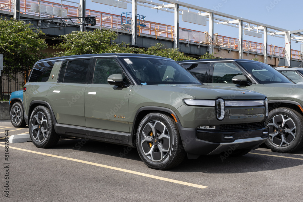 Rivian R1S SUV display. Rivian offers the R1S in Adventure, Adventure ...