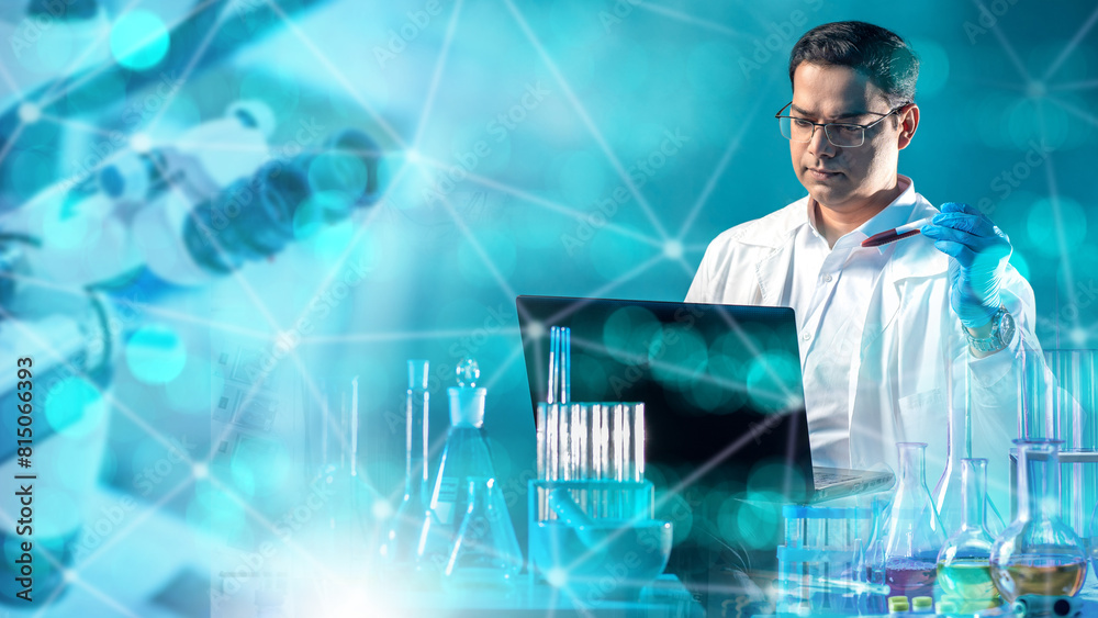 Foto de Doctor in laboratory. Male biologist with laptop. Doctor stands ...