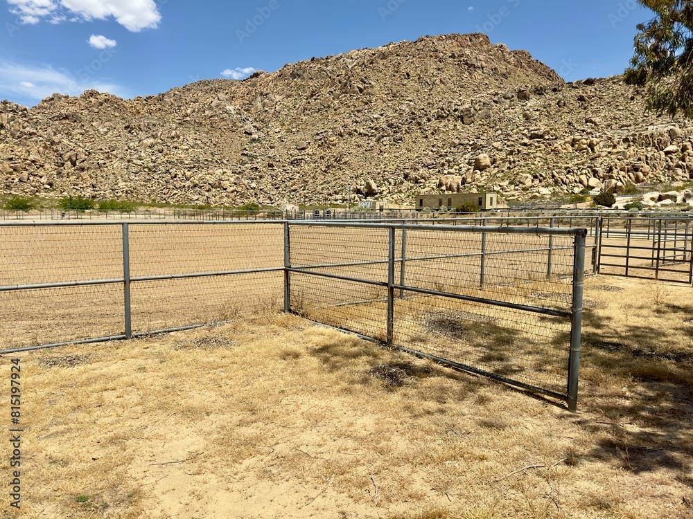 Wild West horse stable corral exudes rugged charm, featuring wooden ...