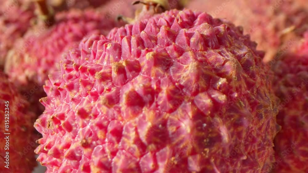 Zooming in, the camera unveils the rugged elegance of lychee skin. Its ...