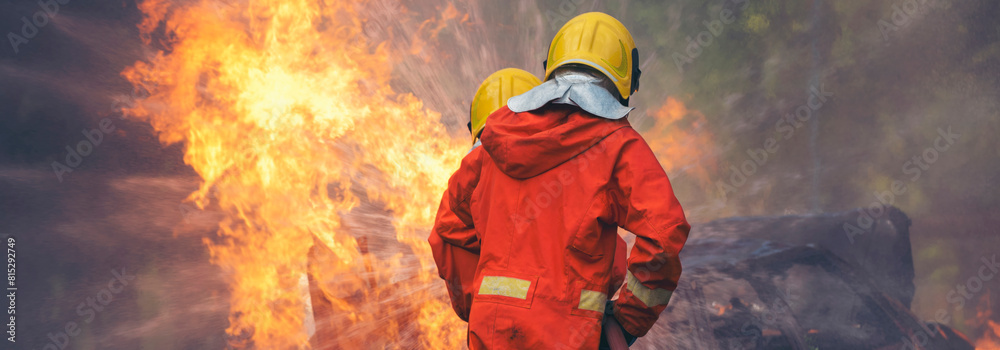 Firefighter fighting smoke flame use fire hose chemical water foam ...
