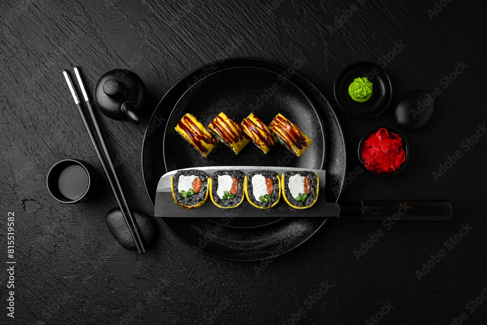 Azumi roll with unaghi sauce, octopus and salmon. Sushi composition on ...