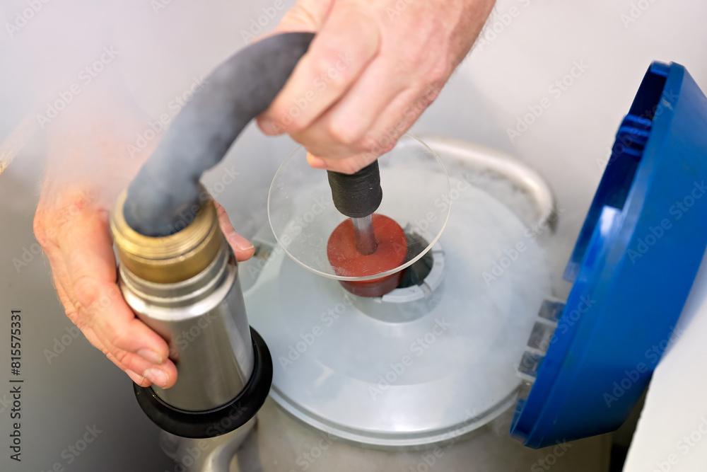 filling liquid nitrogen cryotherapy cannister from dewar, Australian ...
