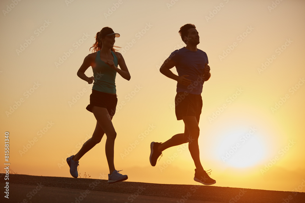 Sunrise, couple and running with silhouette of race training, exercise ...