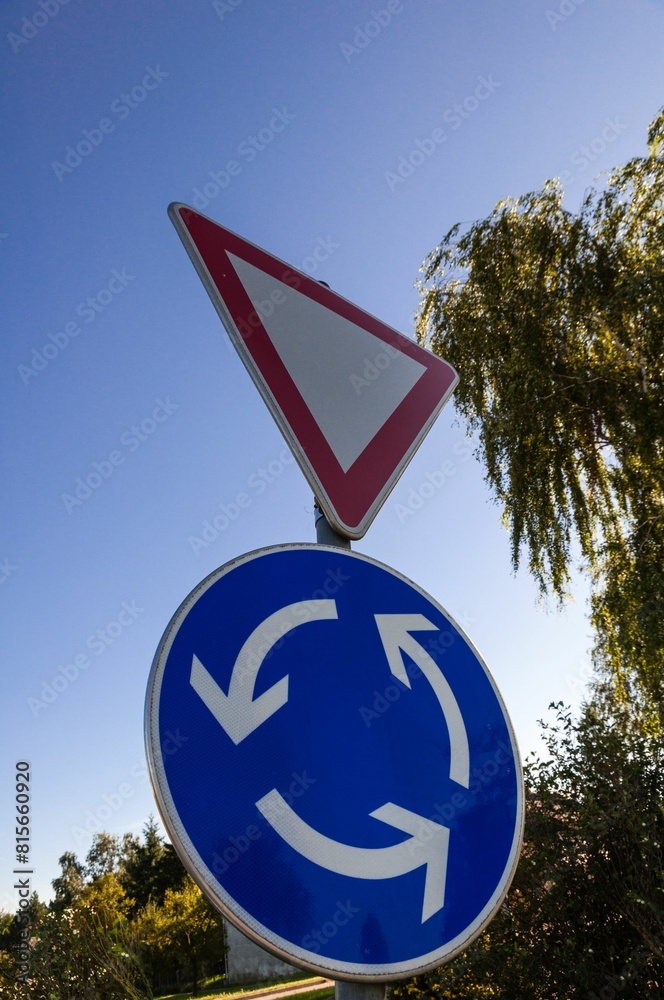 Sign roundabout and give-way, traffic sign Stock Photo | Adobe Stock