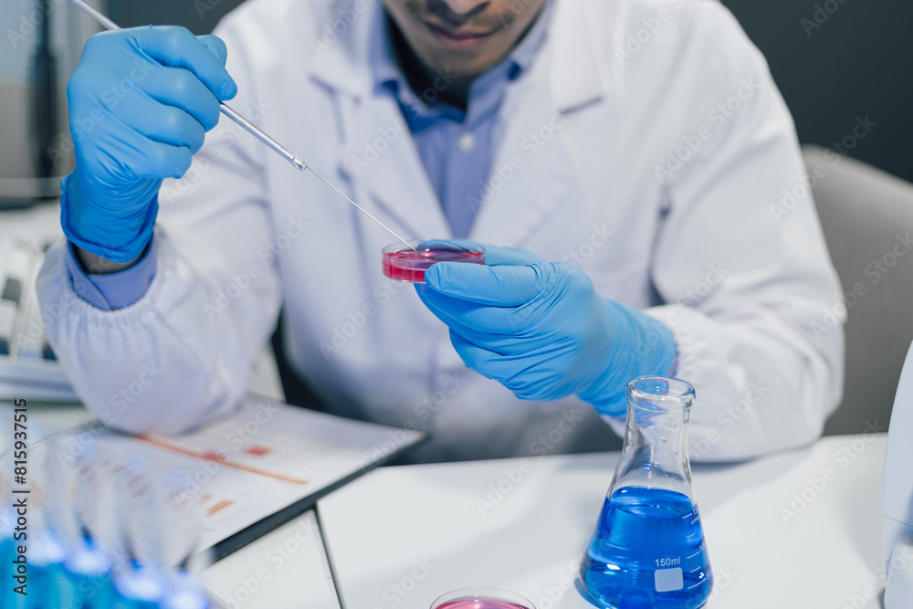 Scientists conduct biology experiments on agar in glass test plate ...