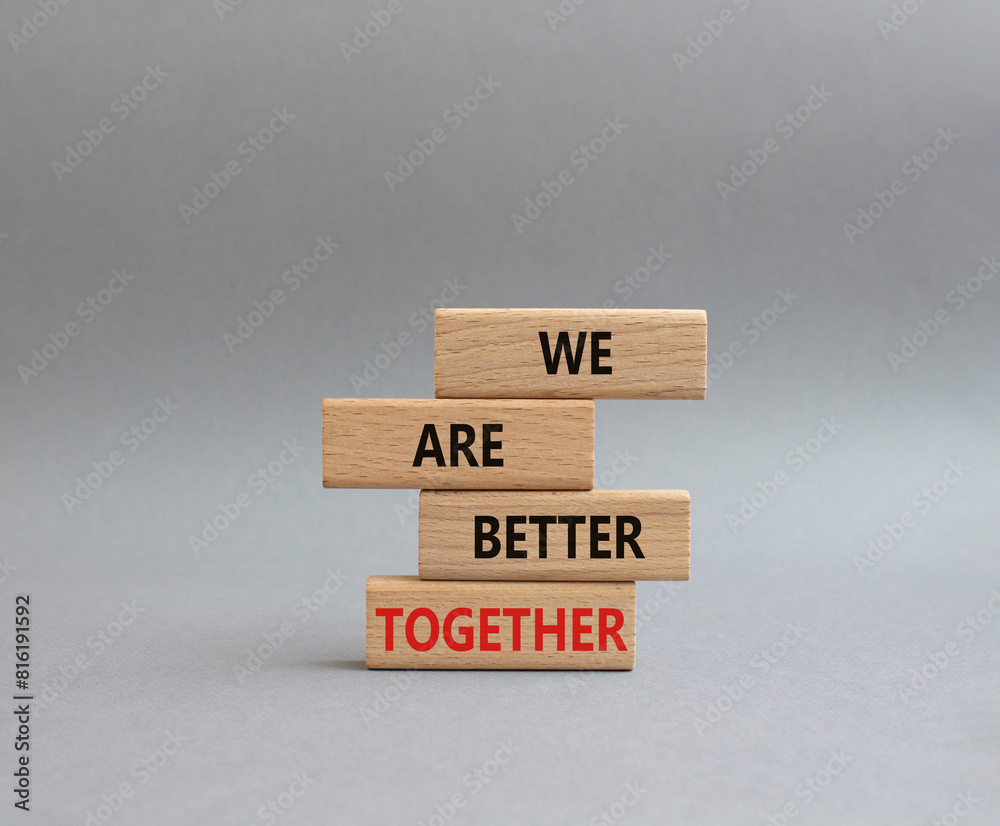 We are better together symbol. Wooden blocks with words We are better ...