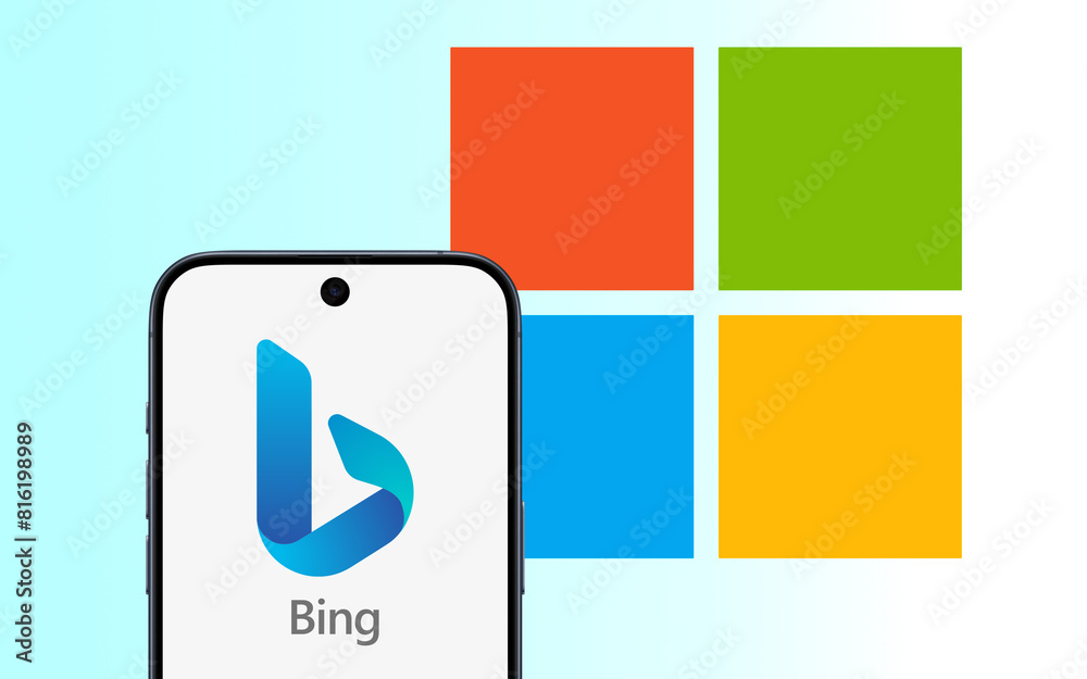 Bing logo is displayed on a modern smartphone, big Microsoft logo ...