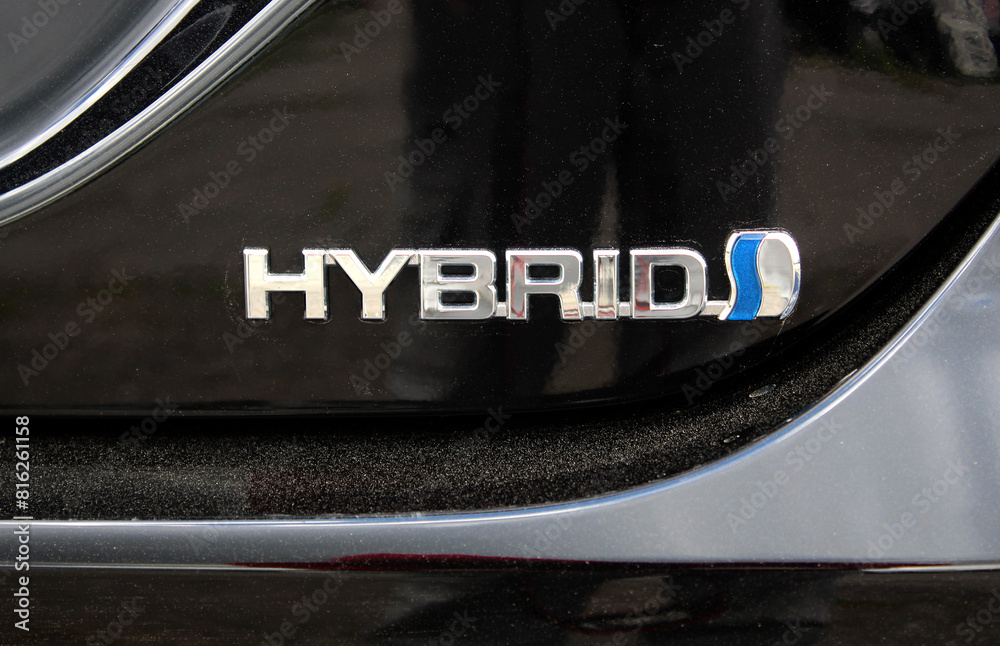Vinnytsia, Ukraine; May 13, 2024. Black Toyota Camry Hybrid logo. New ...