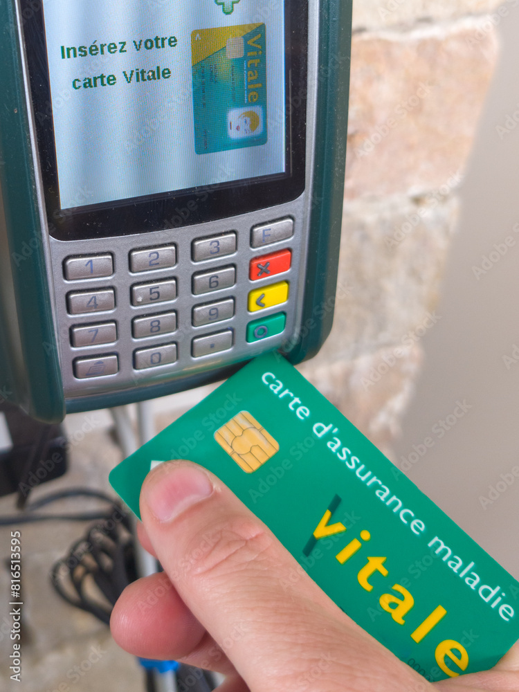 Carte vitale french health insurance card man holding Carte Vitale of ...