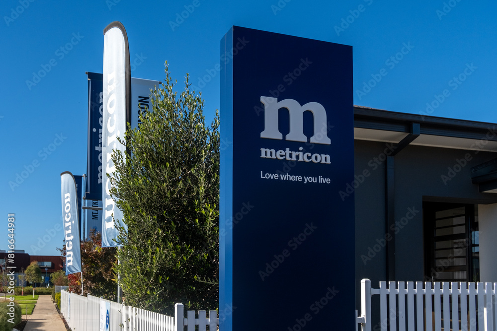 Foto de The sign with the logo of Metricon outside new and modern ...