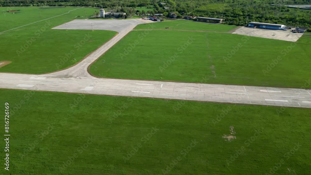 Aerial footage of rural airport runway taxiway and ramp. Airfield ...