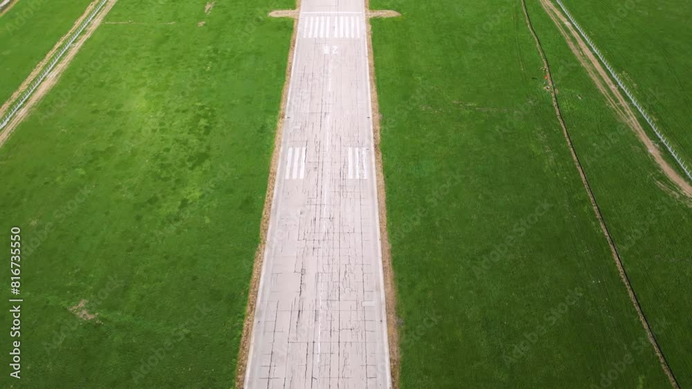 Aerial footage of rural airport runway taxiway and ramp. Airfield ...