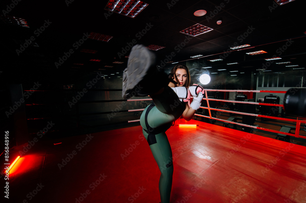 Full length shot of stylish young woman athlete in black sportswear ...