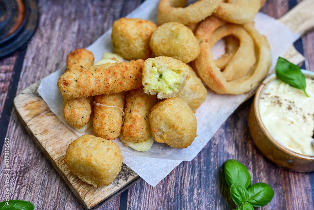 Selection of fast food snack. italian cheese breaded Mozzarella Sticks ...