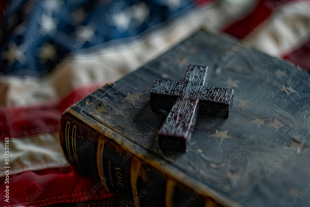 Christian cross resting on a Bible with the American flag, representing ...